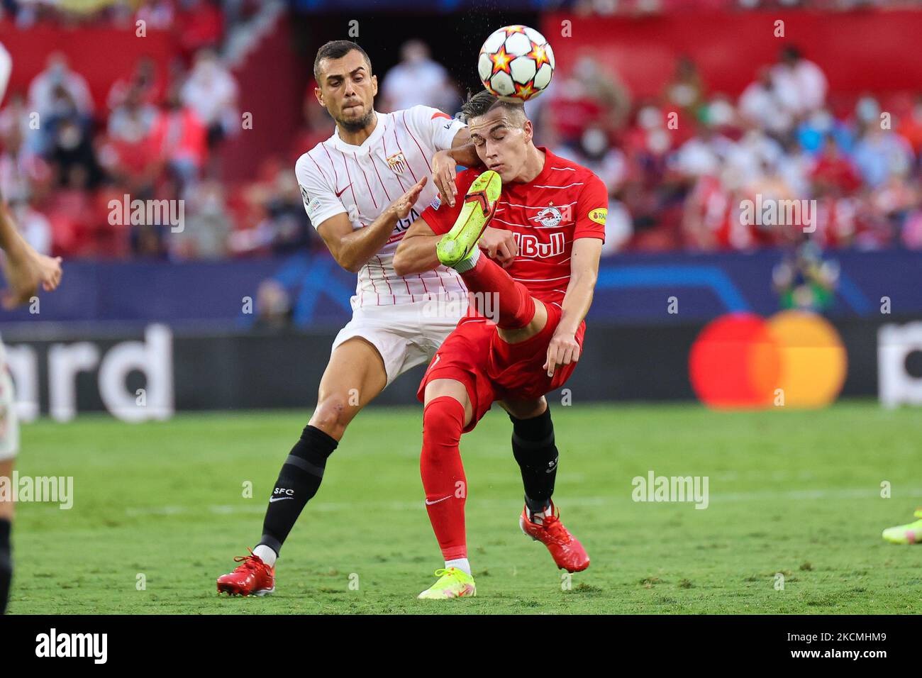 Luka Sucic of RB Salzburg in action with Joan Jordan of Sevilla CF ...
