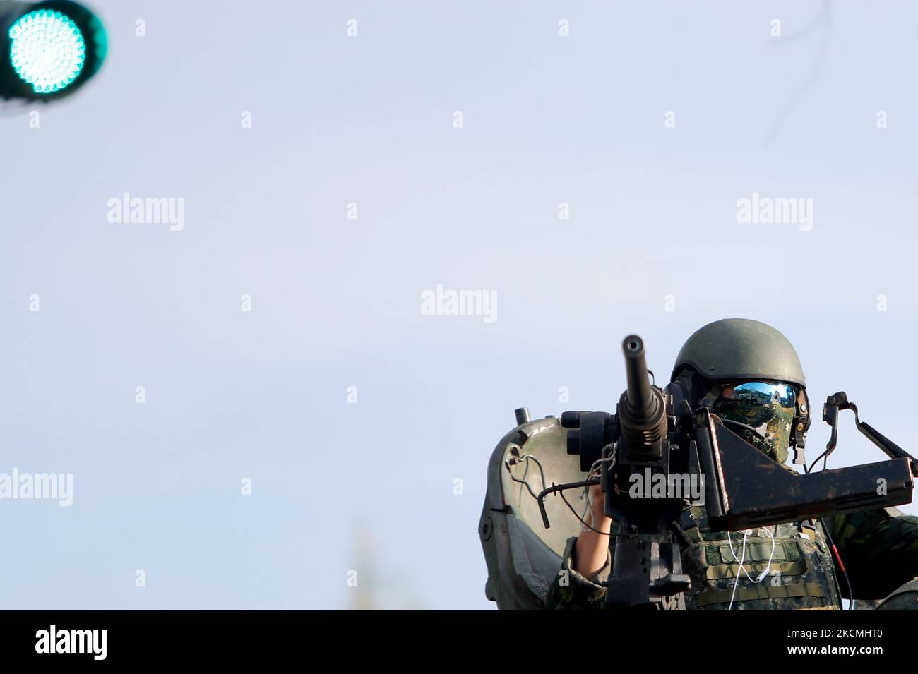 Taiwanese soldiers are seen holding grenade launchers and machine guns ...