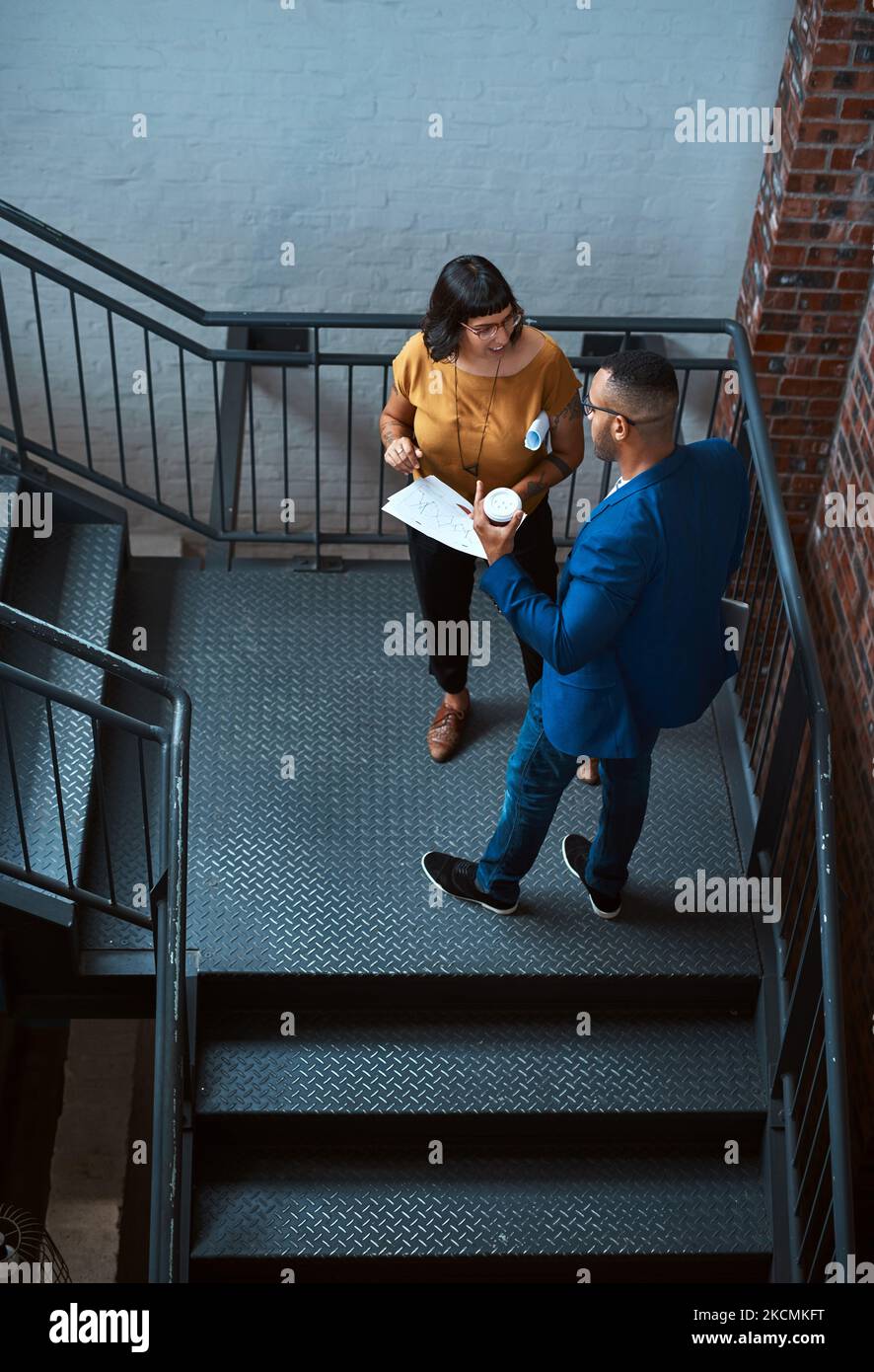 Theyre always one step ahead. two young designers having a discussion ...