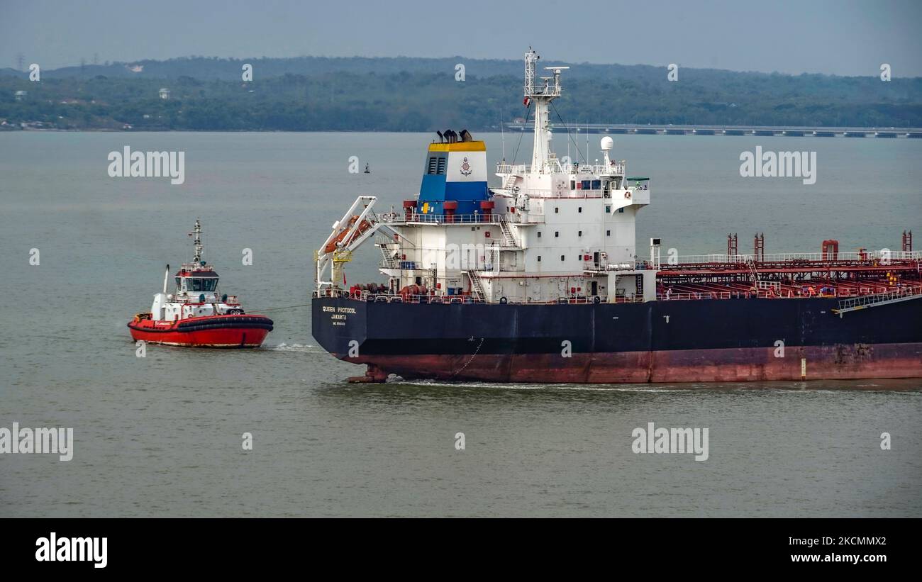Tugboat and tanker ship maneuver in Tanjung Perak port area, Surabaya ...