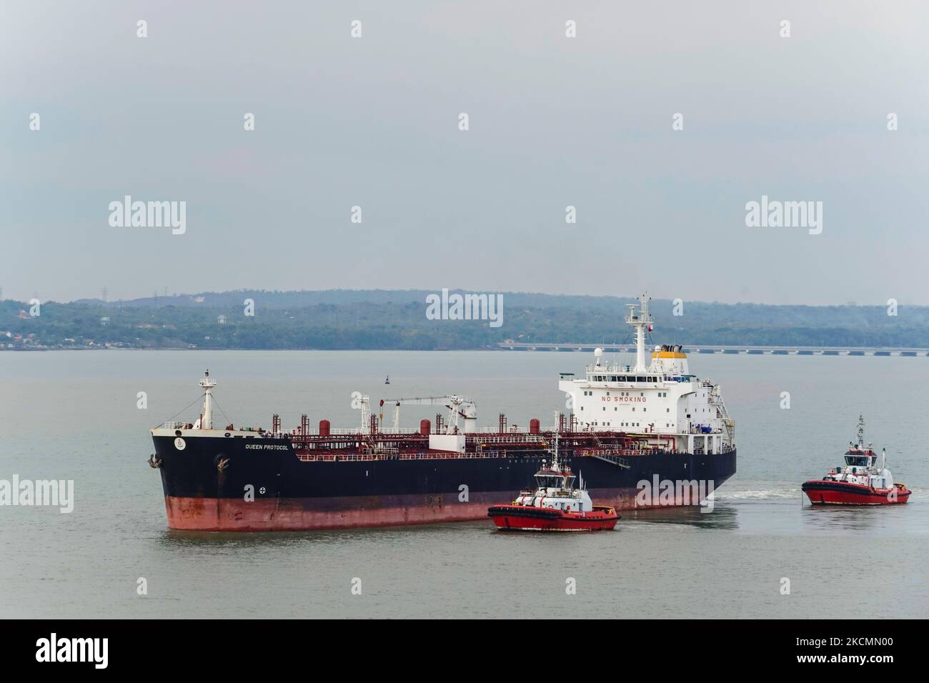 Tugboat and tanker ship maneuver in Tanjung Perak port area, Surabaya ...