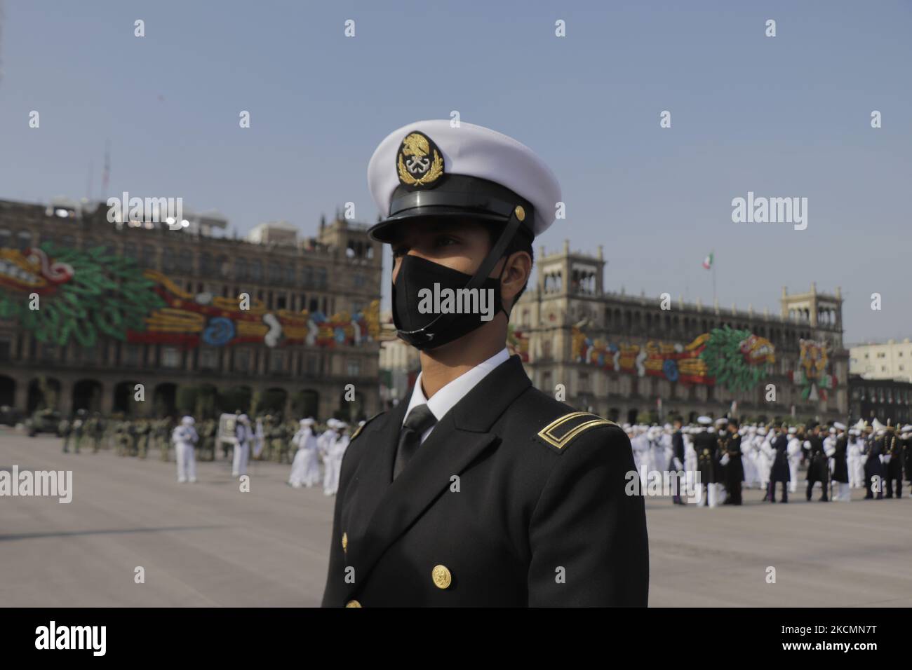 A member of the Secretariat of the Navy in Mexico City's Zócalo, during ...