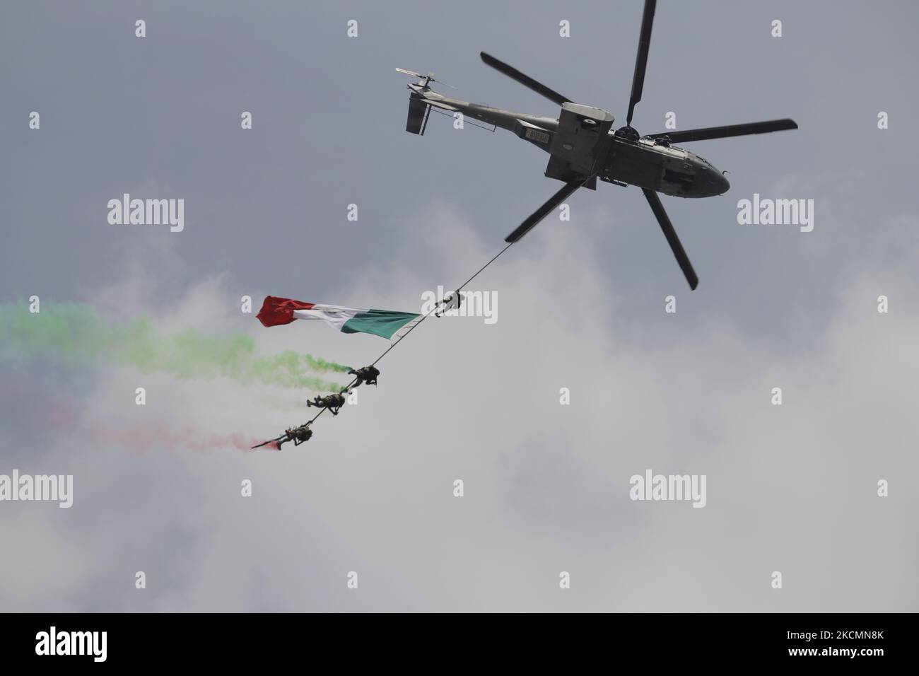 A helicopter and members of the Mexican army during an aerial military ...