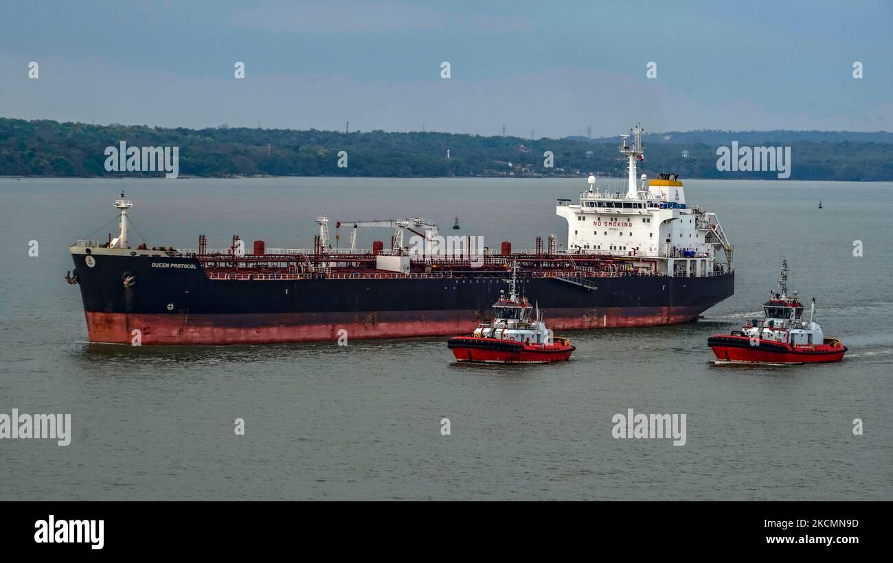 Tugboat and tanker ship maneuver in Tanjung Perak port area, Surabaya ...