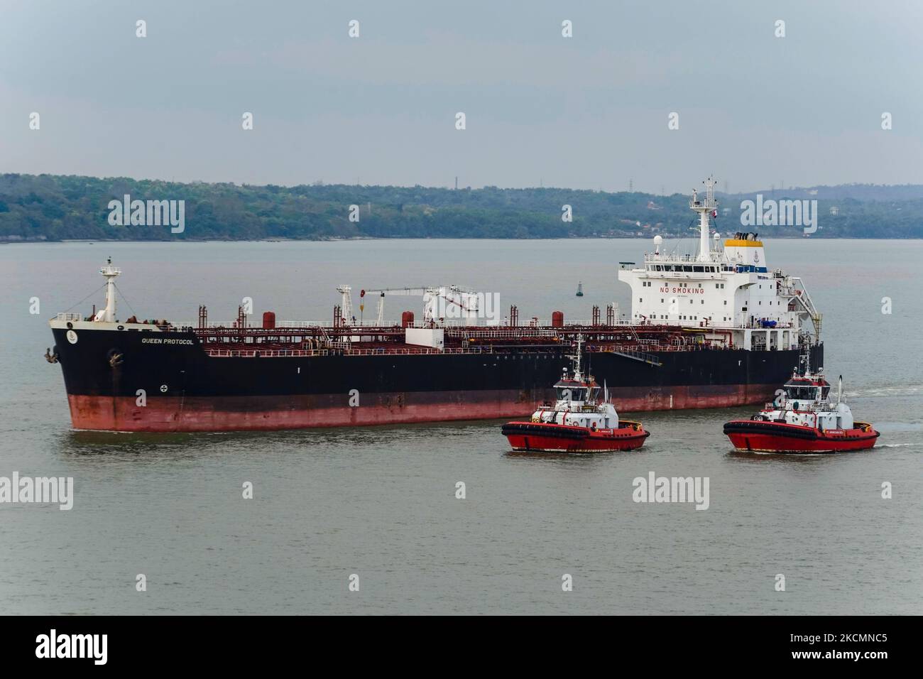 Tugboat and tanker ship maneuver in Tanjung Perak port area, Surabaya ...