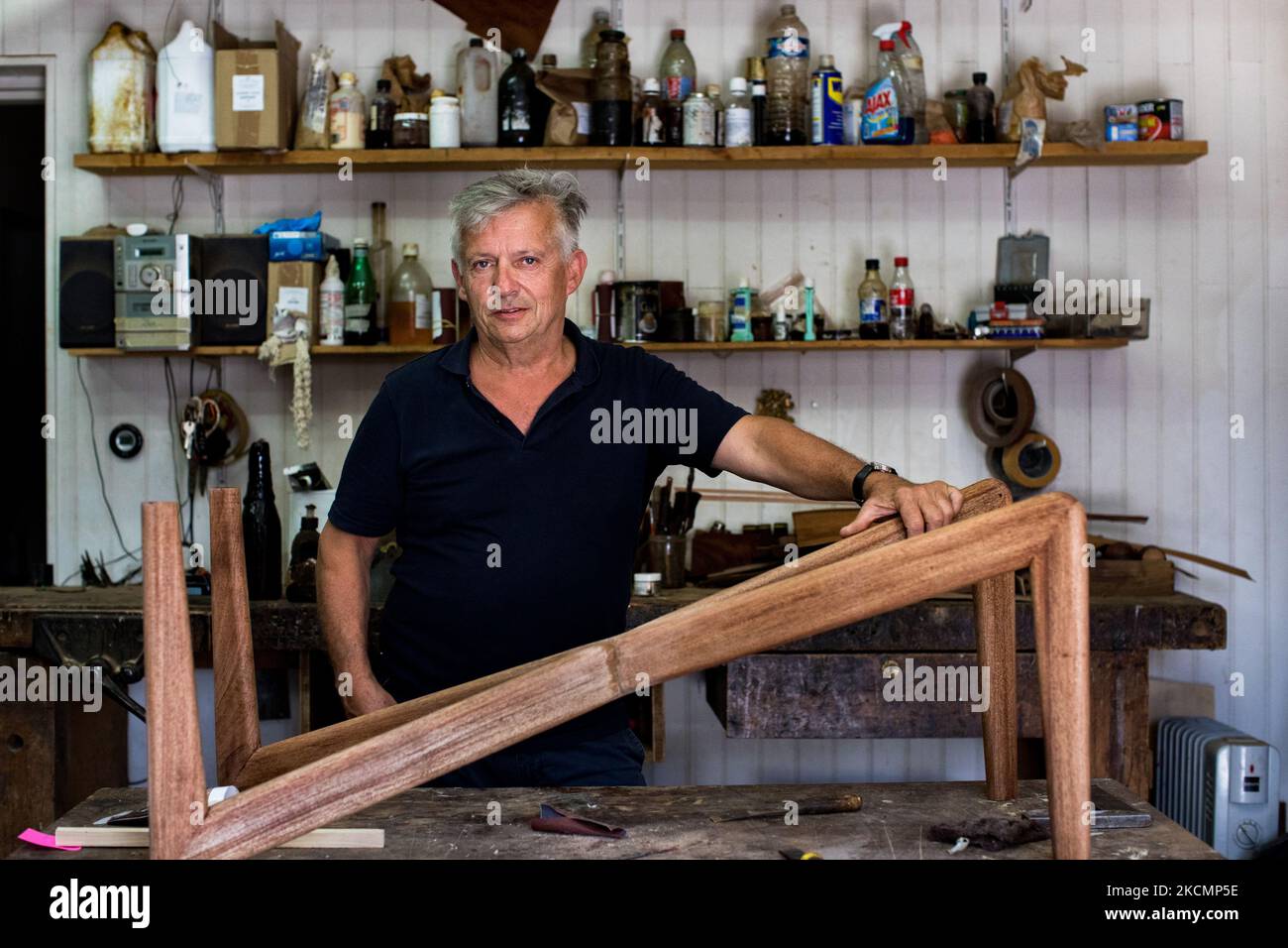 Saint-Ouen, France on July 20th 2021. Portrait of Armel Simon, cabinetmaker restorer, in his ...