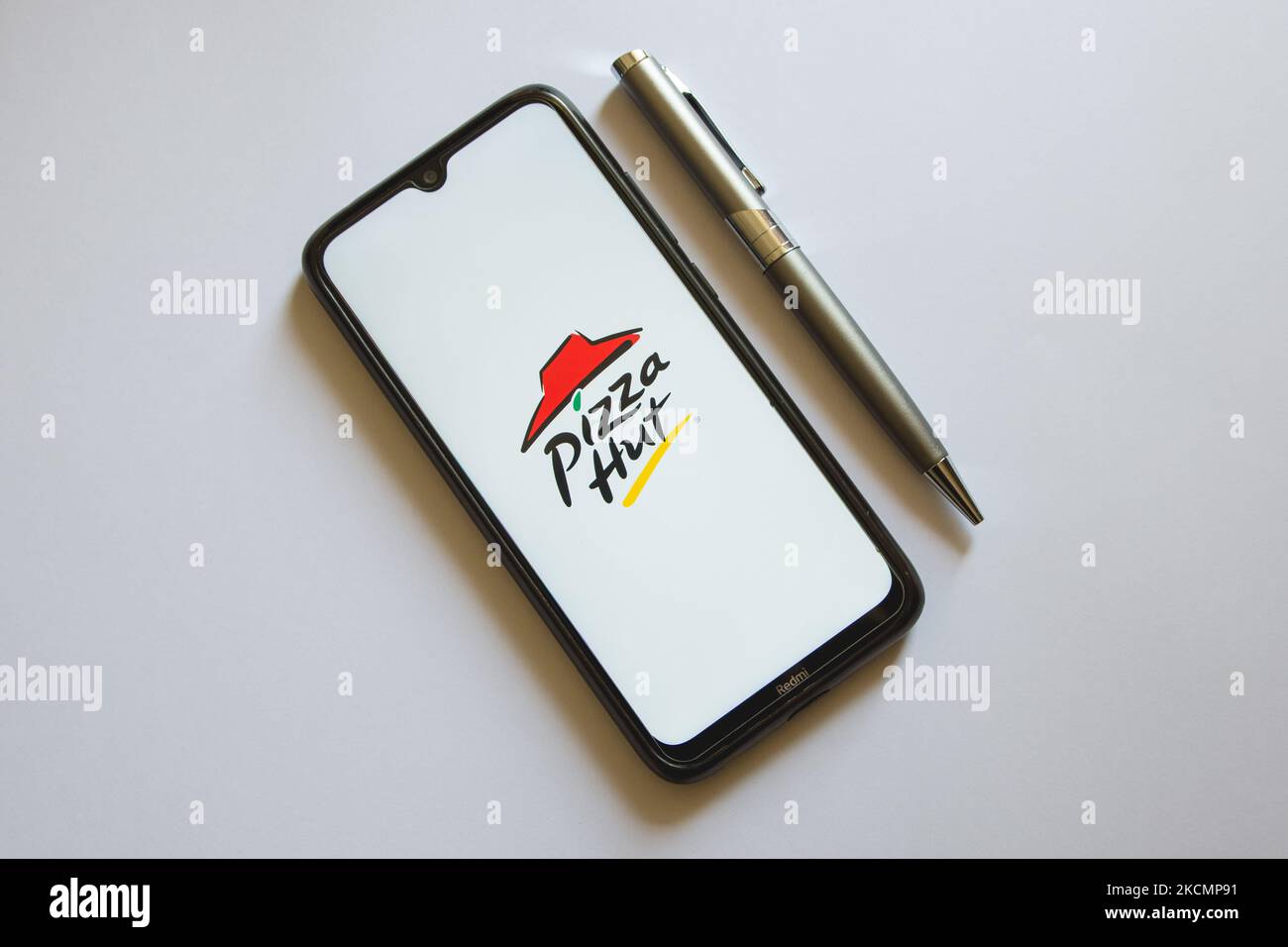 In this photo illustration a Pizza Hut logo is display on a smartphone ...