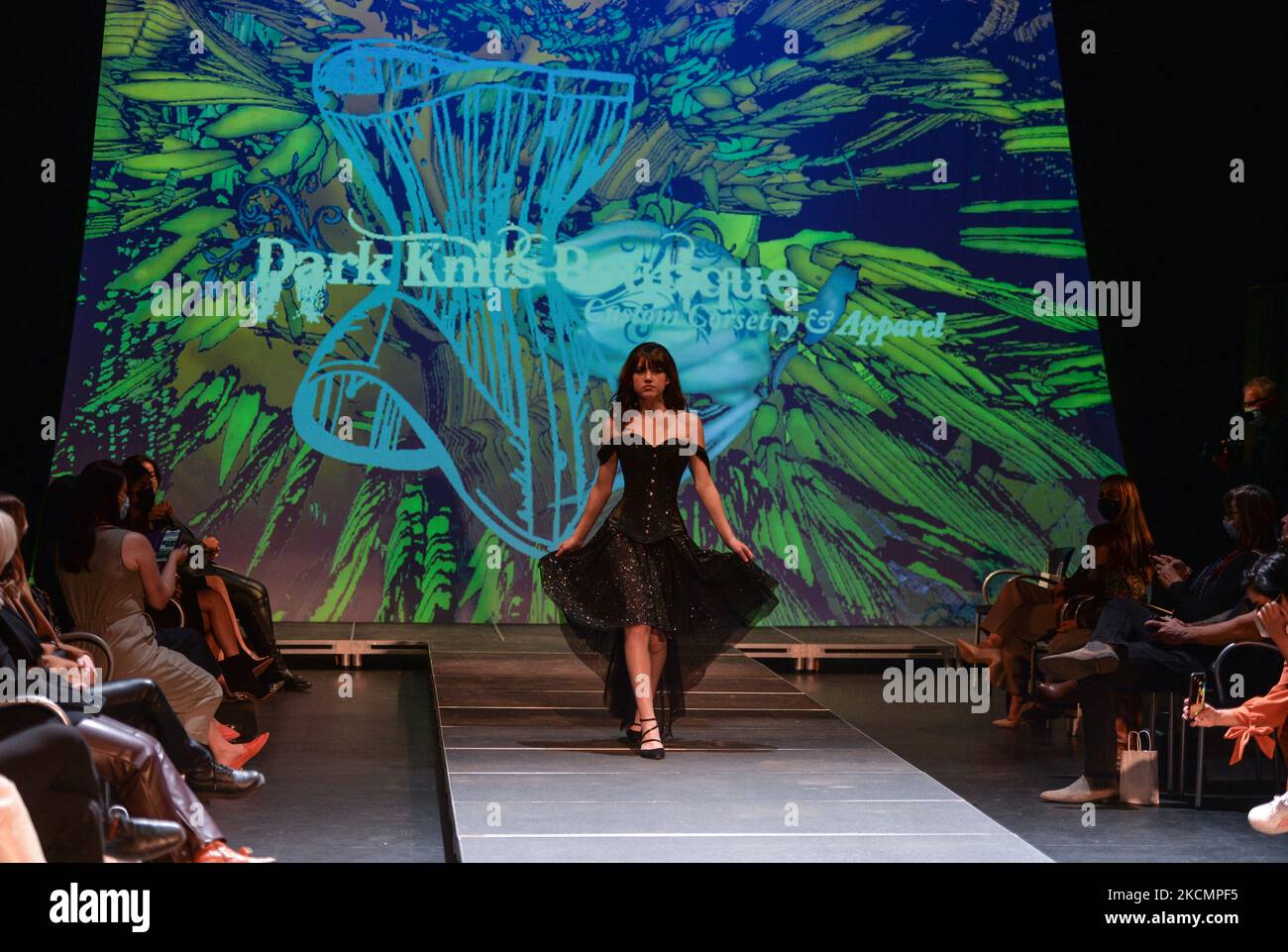 A model shows off an outfit by the Dark Knits collection at the ...