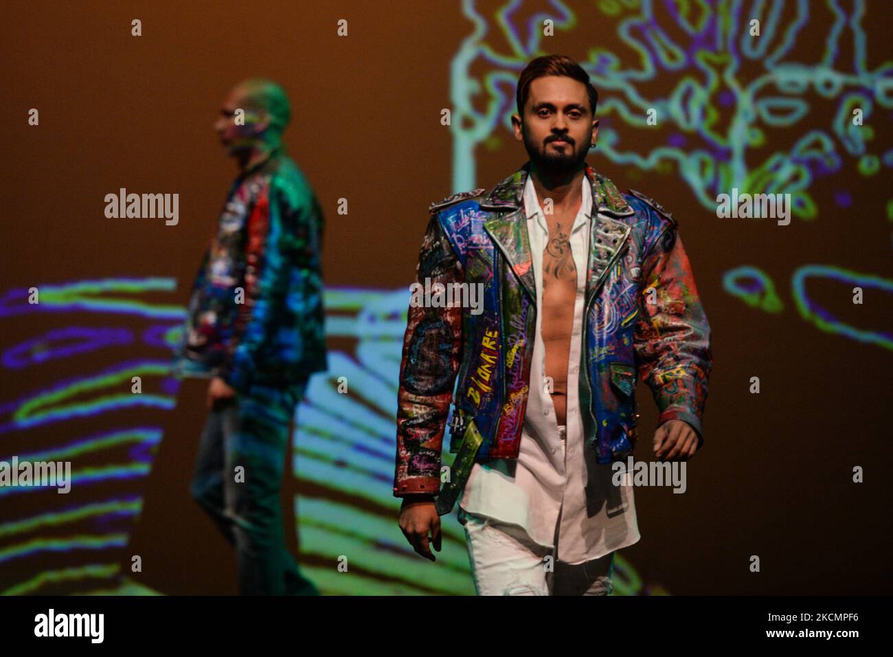 A model shows off an outfit by the Upcycled - Dov Alexander collection ...