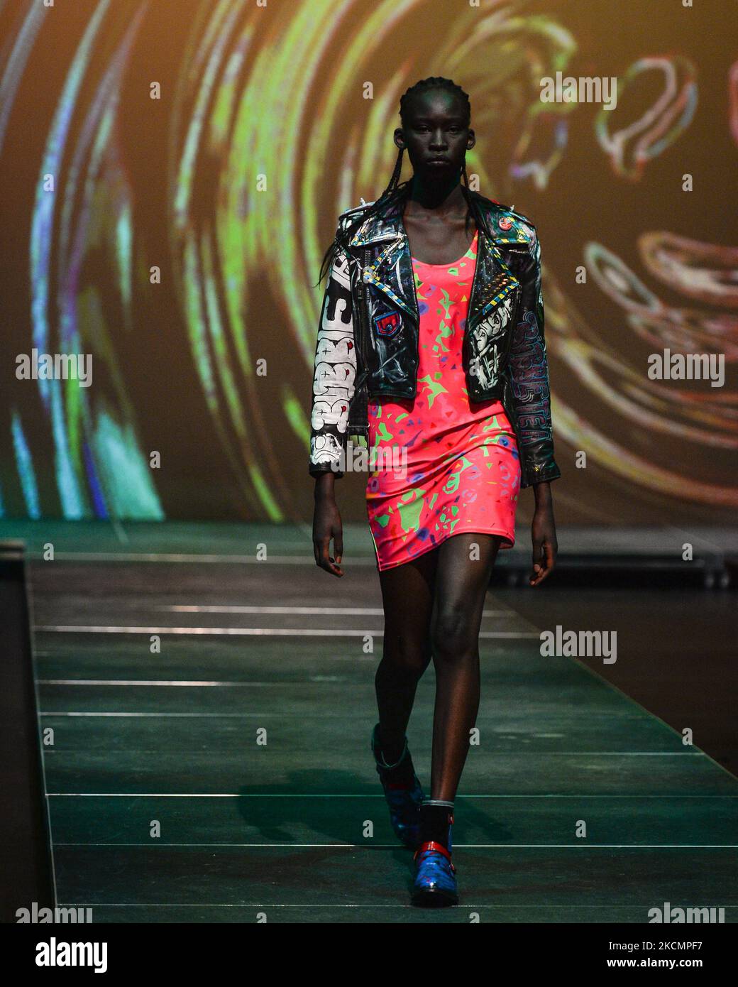 A model shows off an outfit by the Upcycled - Dov Alexander collection ...