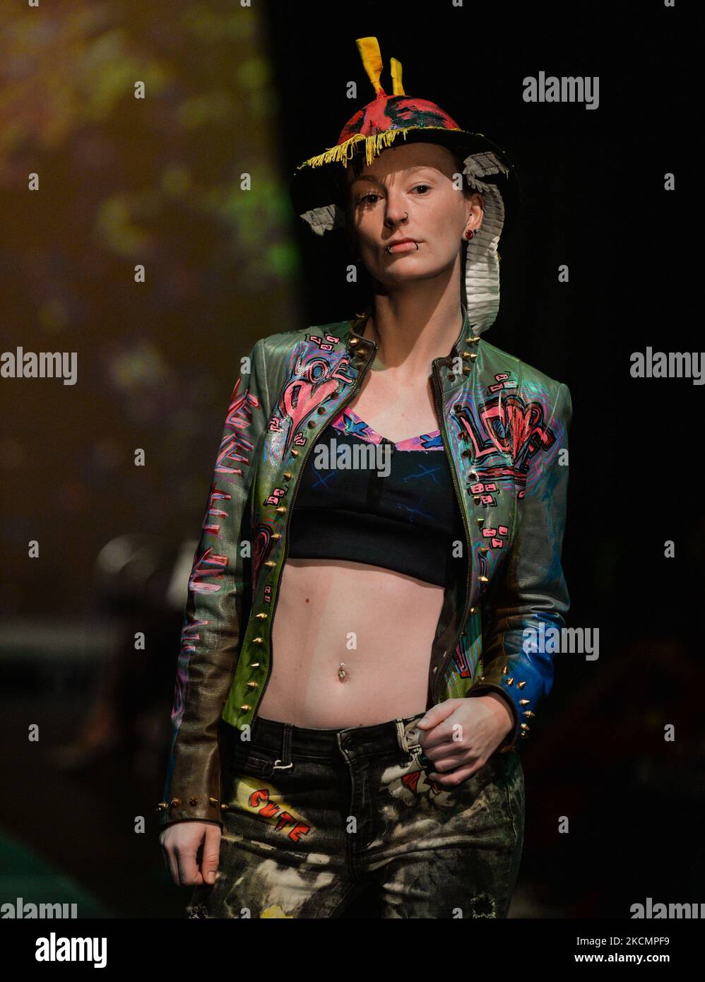 A model shows off an outfit by the Upcycled - Dov Alexander collection ...