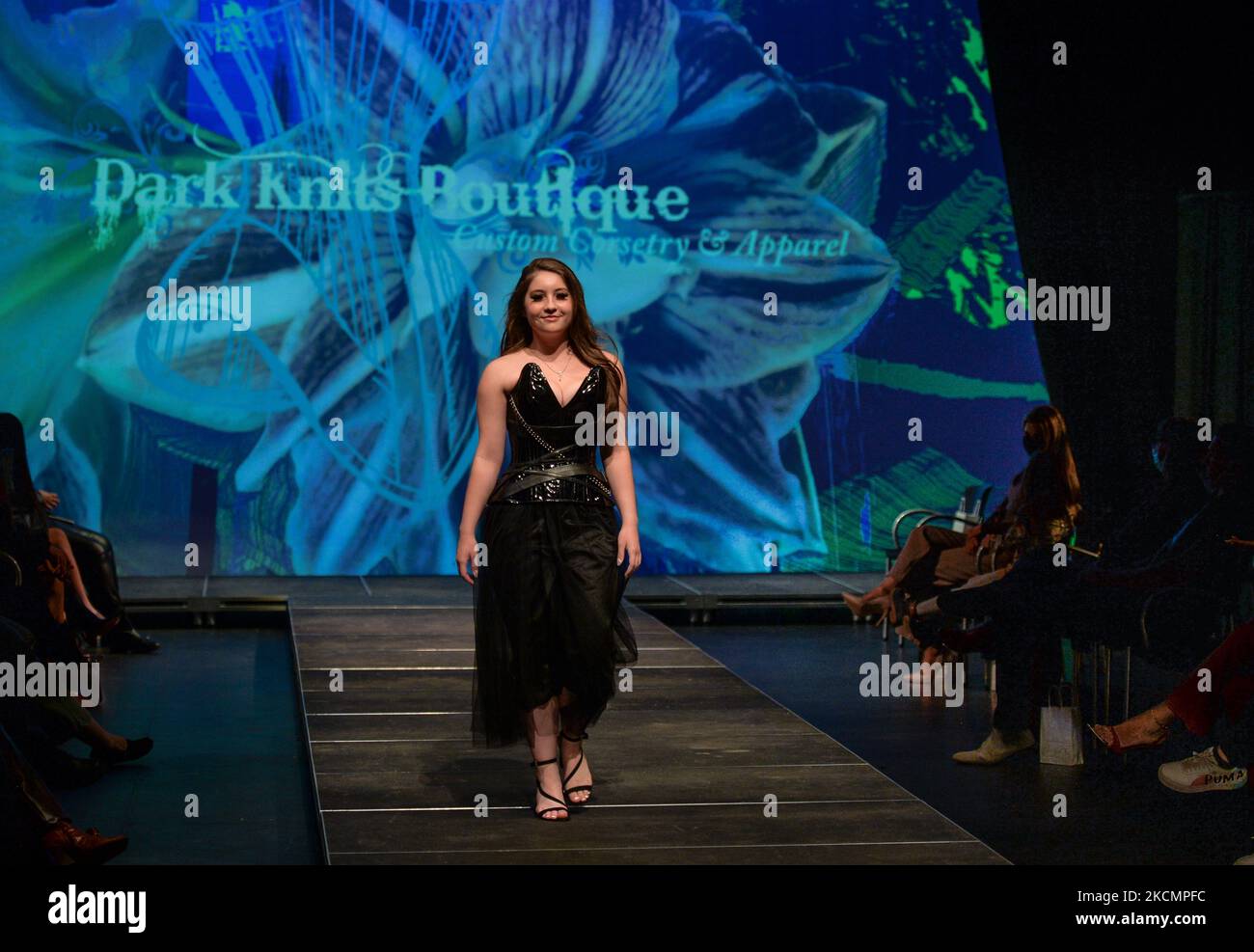 A model shows off an outfit by the Dark Knits collection at the ...