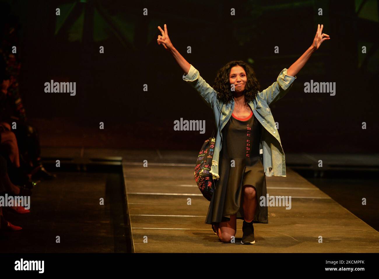 A model and designer shows off an outfit by the Christcitizen ...