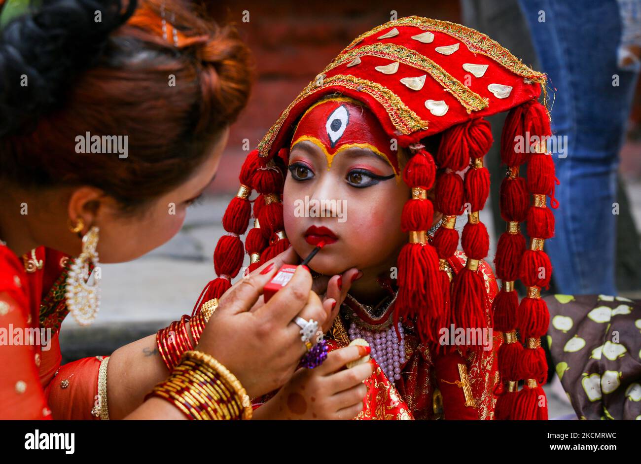 A young girl dressed as the living Goddess Kumari takes part in the ...