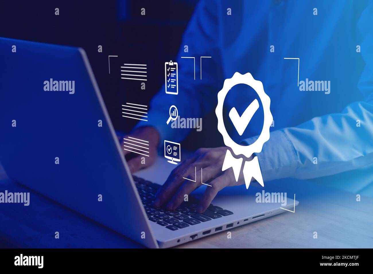Businessman with sign of top service via notebook (Laptop). ISO ...