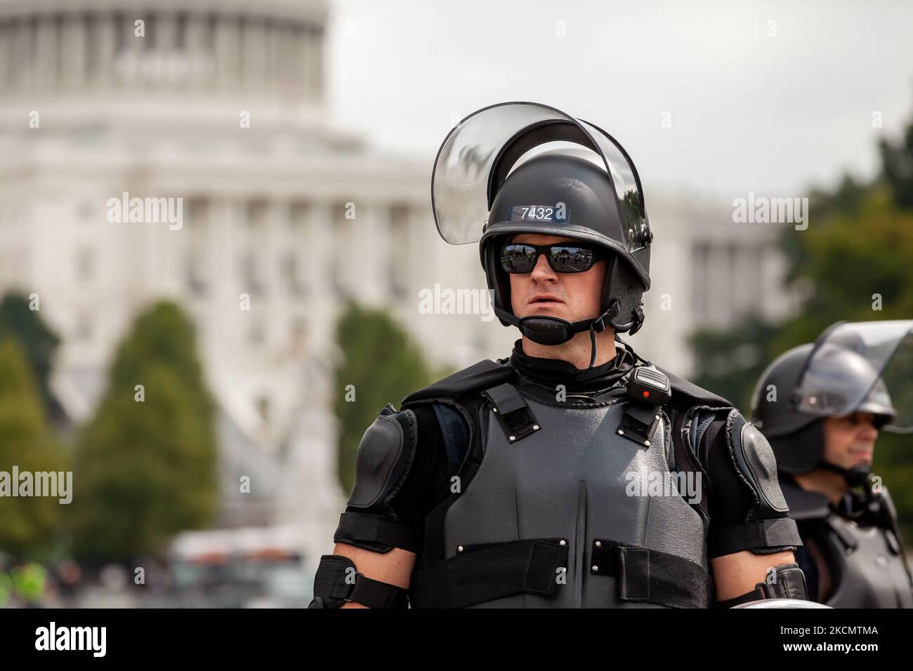 A Capitol Police officer in riot gear is one of hundreds guarding the ...