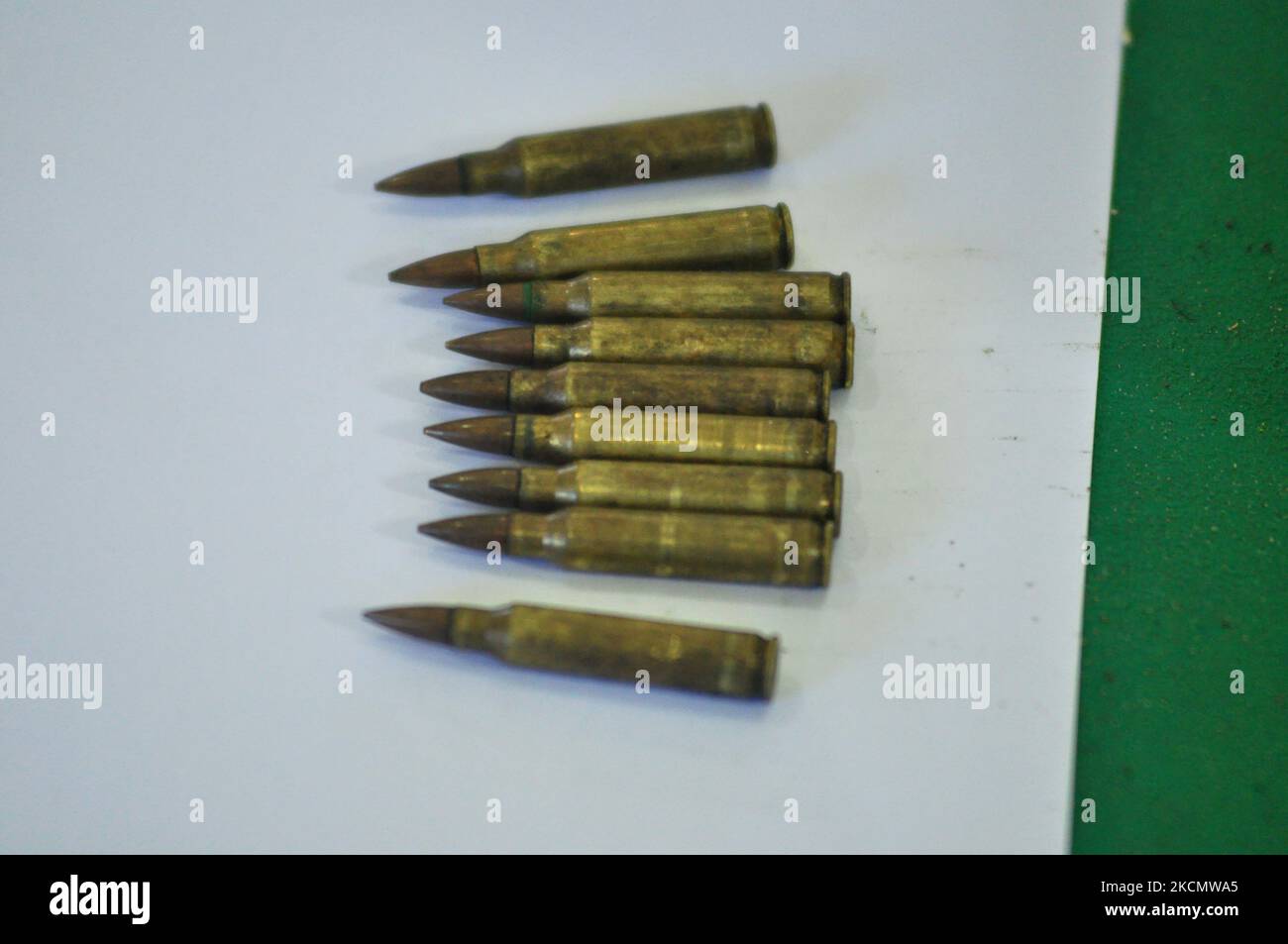 The case was held with nine live bullets, along with evidence of an M16 ...
