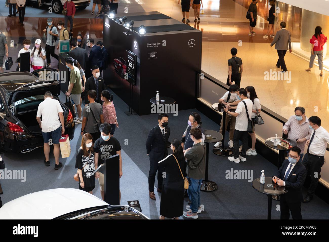 Hong Kong, China, 12 Sep 2021, People crowd a Mercedes-Benz stand in ...