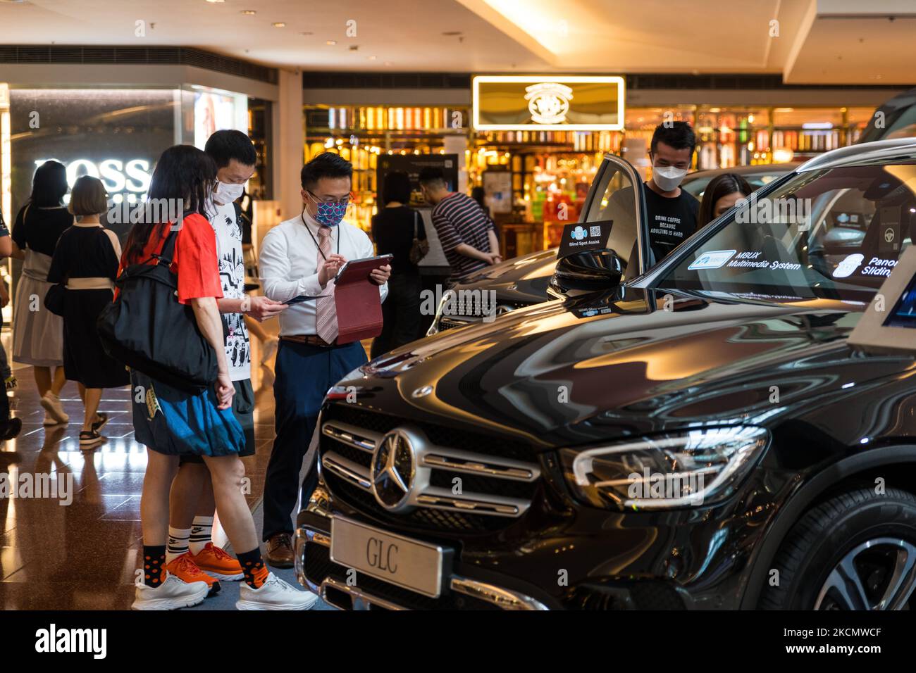 Hong Kong, China, 12 Sep 2021, People crowd a Mercedes-Benz stand in ...