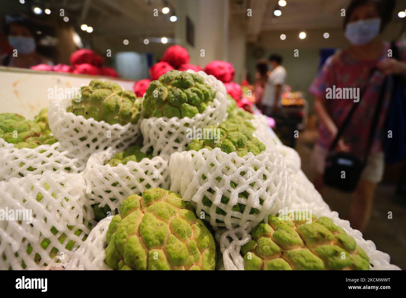 Sugar-apples are displayed at a fruit shop following Chinaâ€™s ban on ...