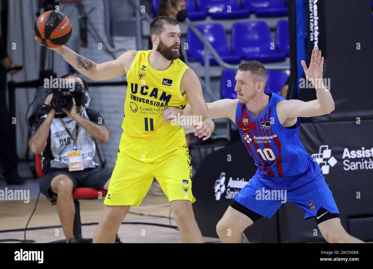 Nemanja Radovic and Rolands Smits during the match between FC Barcelona ...