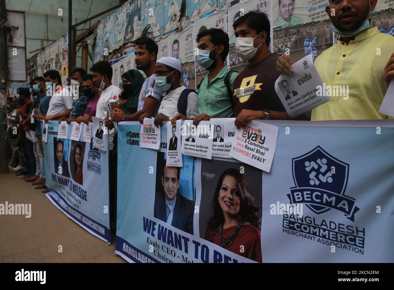 Merchants and customers form a human chain demanding the release of the ...