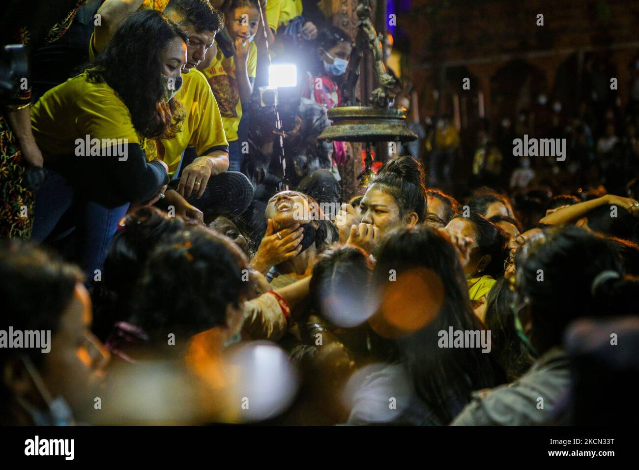 Nepalese women drink homemade alcohol poured from the mouth of Swet ...