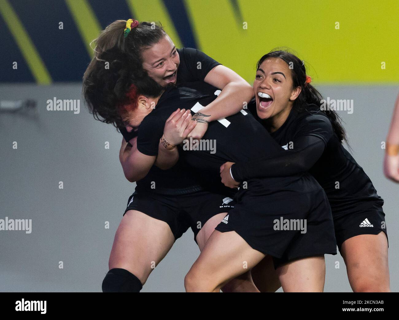 New Zealand's Ruby Tui celebrates her try with Renee Holmes and Stacey ...