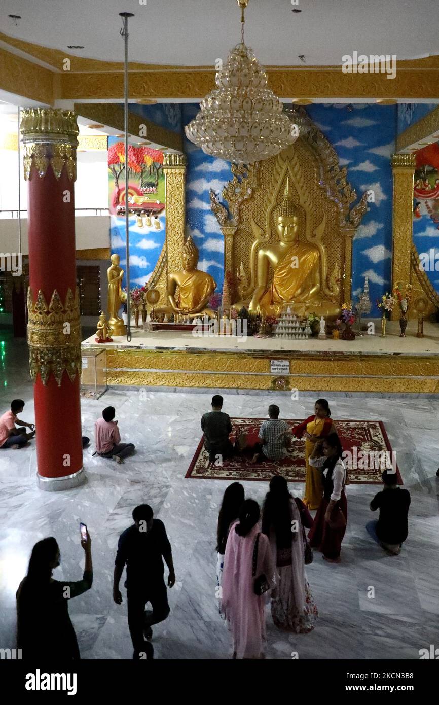 People visit an international Buddhist monastery during a celebration ...