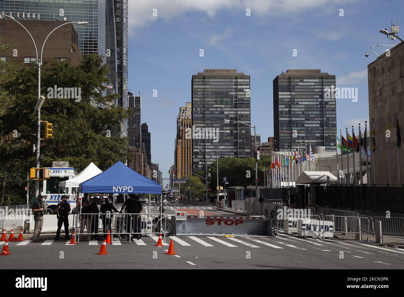 Television media broadcast commentaries as delegates arrive to the ...