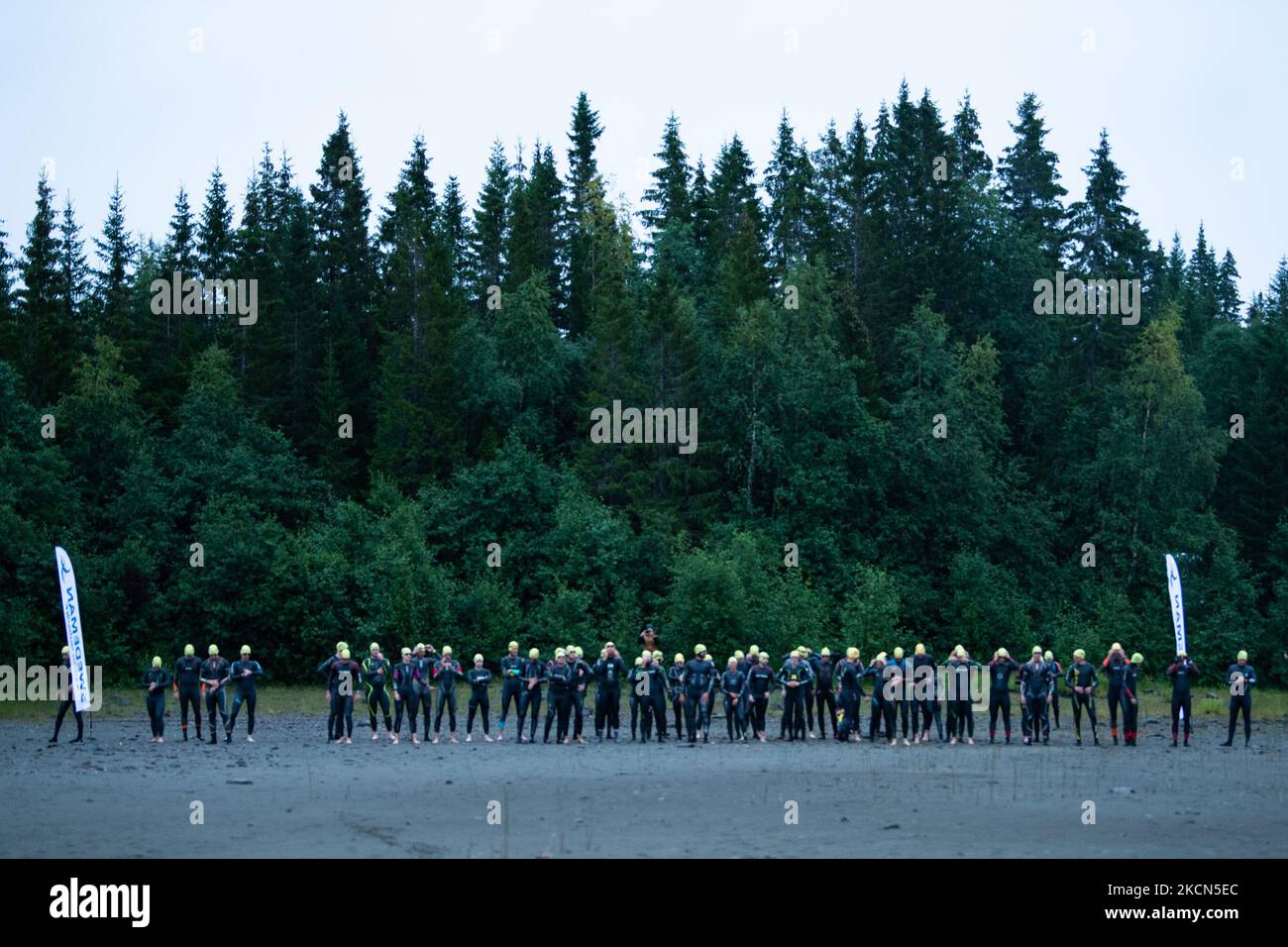 The athletes lined up at the Swim start, at Swedeman 2021 in Åre ...