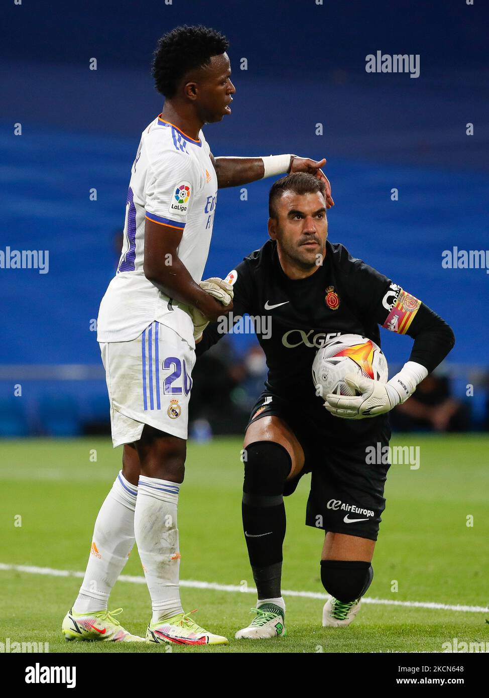 Vinicius Junior of Real Madrid with Manolo Reina of RCD Mallorca during ...