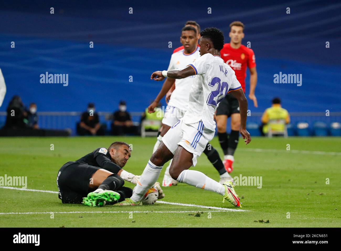 Manolo Reina of RCD Mallorca in action with Vinicius Junior of Real ...