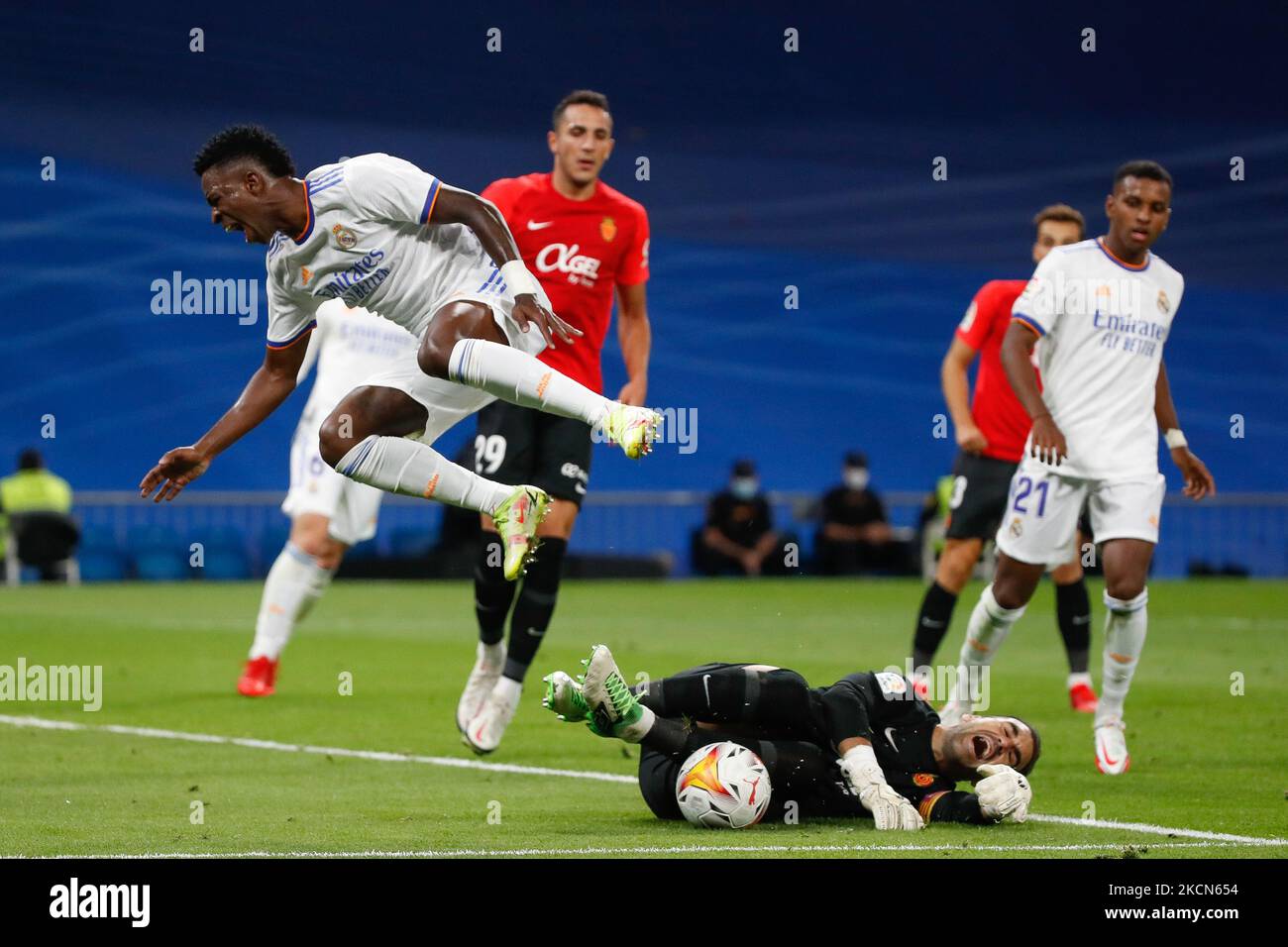 Manolo Reina of RCD Mallorca in action with Vinicius Junior of Real ...