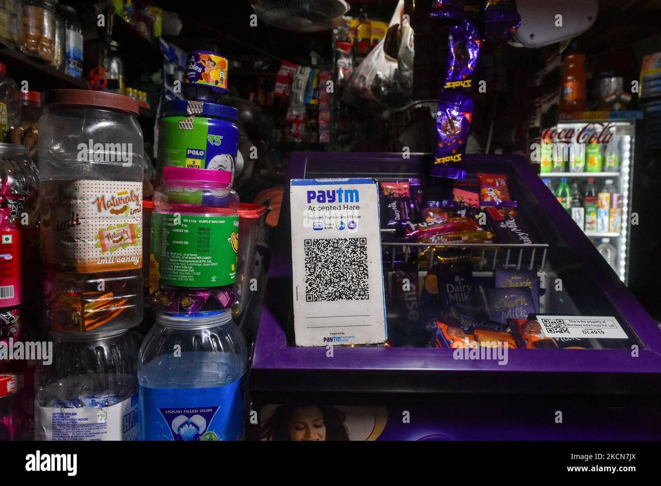 A Paytm QR code card as seen at a street side shop in Kolkata, India ...