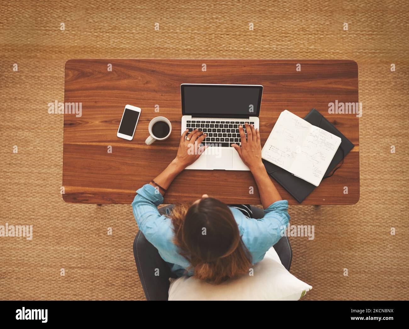 Getting her company off the ground. High angle shot of an ...