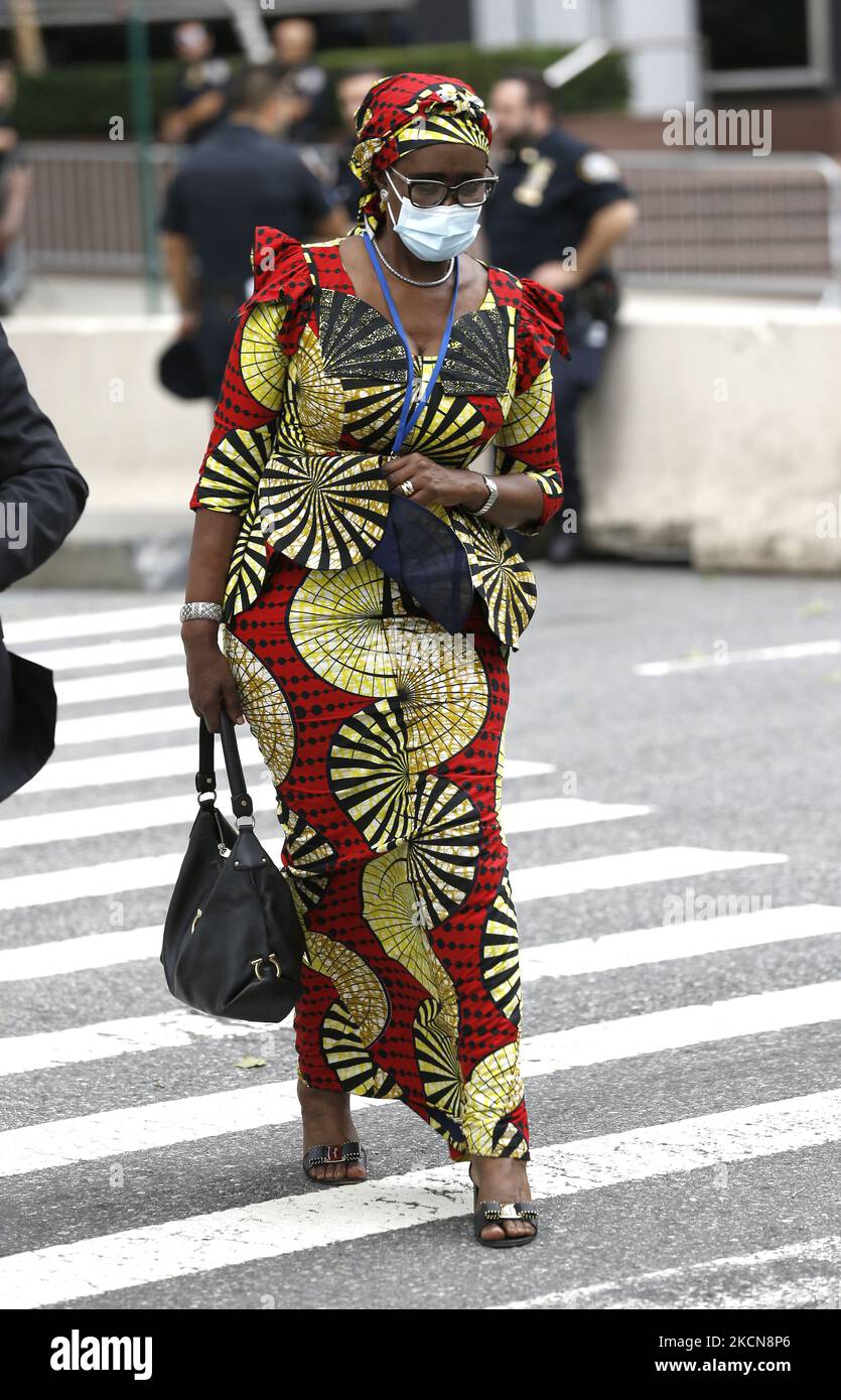 Delegates to the UN are seen outside the United Nations during the 76 ...