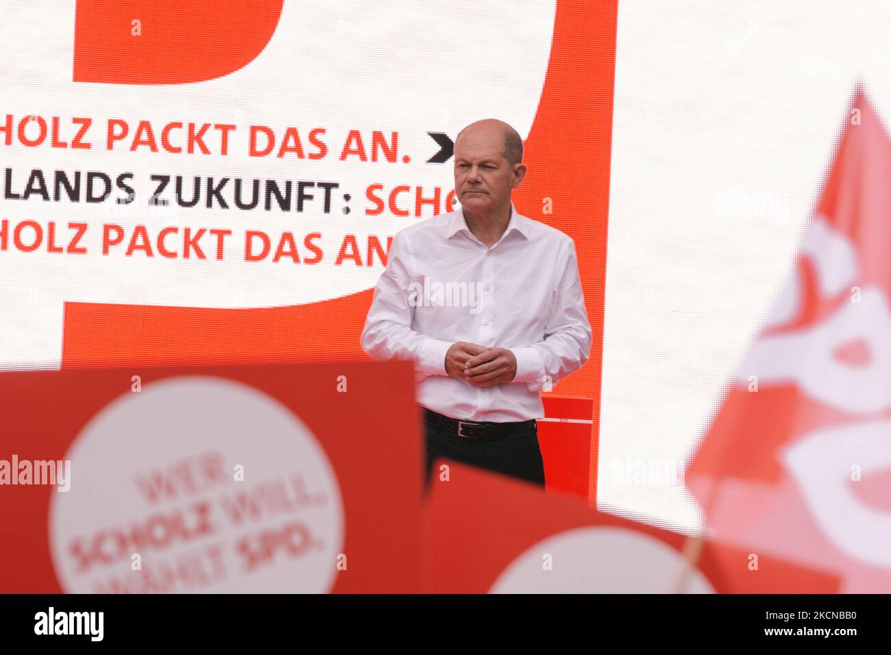social democratic party candidate Olaf Scholz speaks to the crowd ...