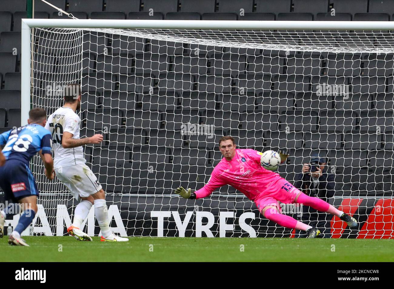 Troy Parrott scores from the penalty spot for Milton Keynes Dons, to ...