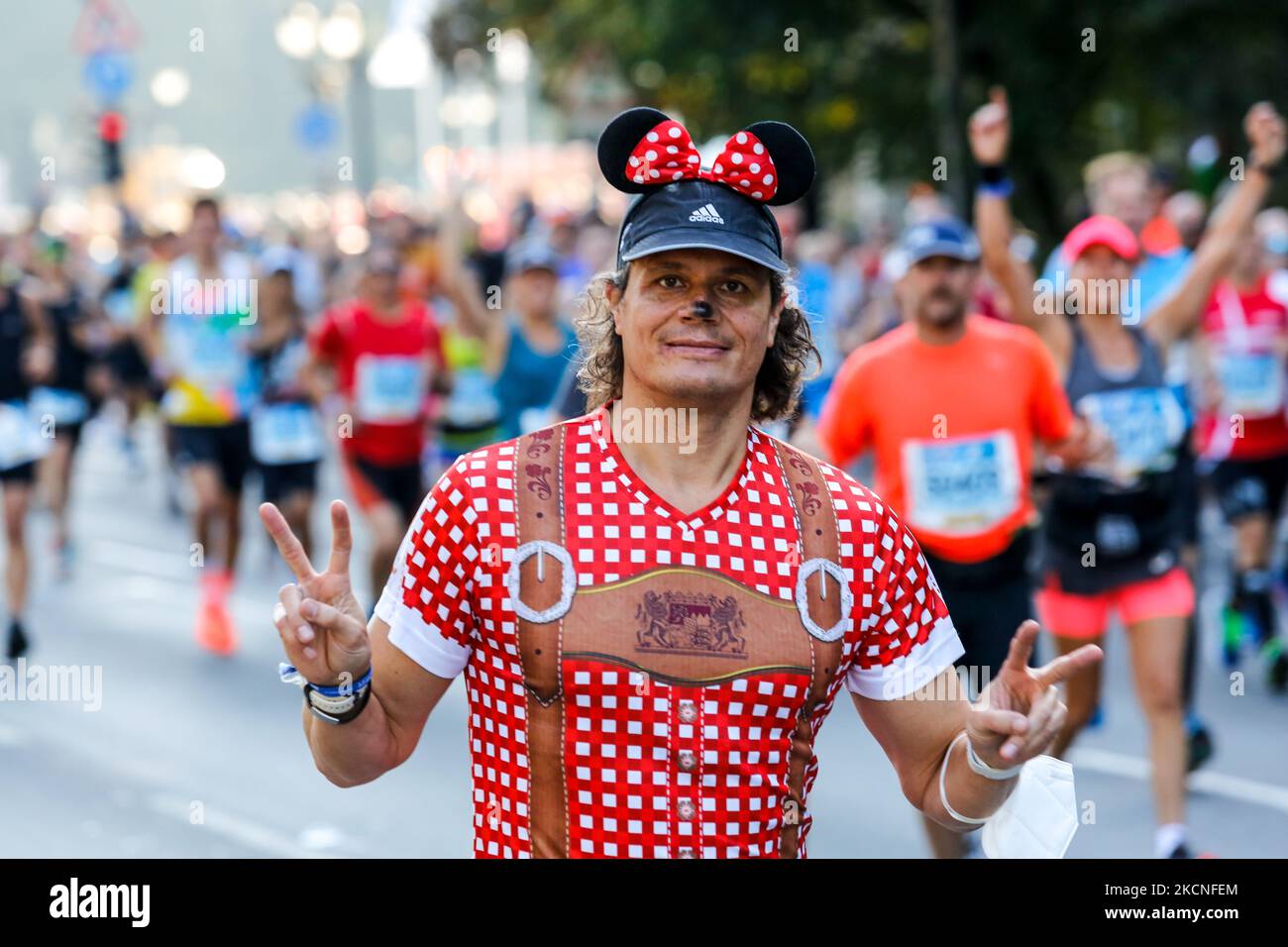 Participants run as thousands of people participate in 47. BMW at ...
