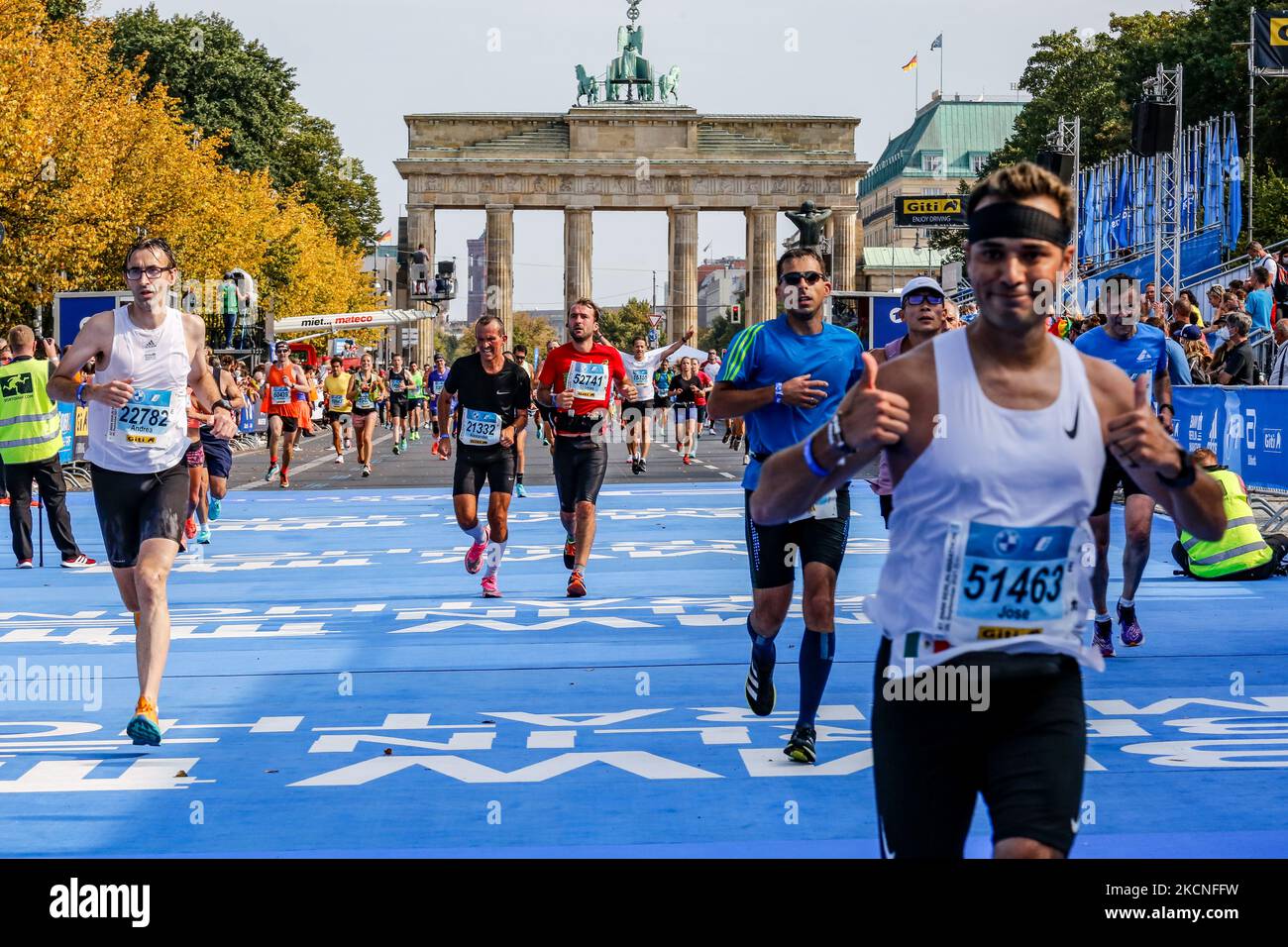 Participants run as thousands of people race in 47. BMW at ...