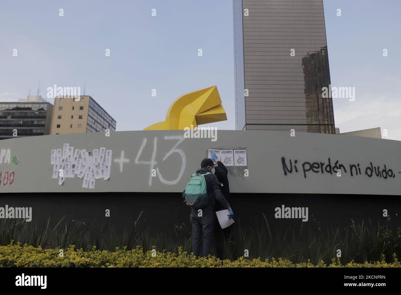 Partners of the 43 missing students from Ayotzinapa, Guerrero, painted ...