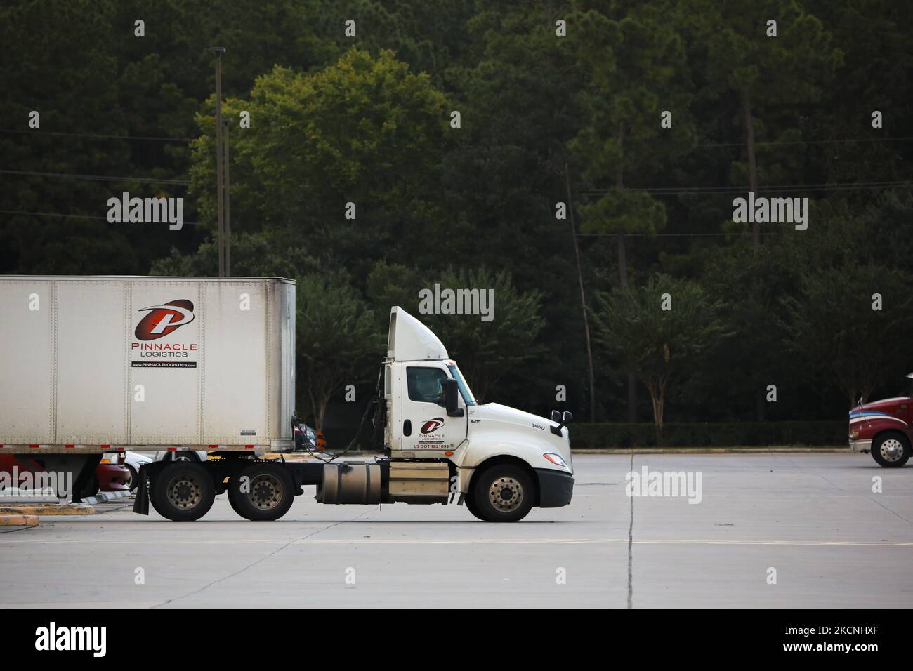 18-Wheelers come and go from the cargo bay at George Bush ...