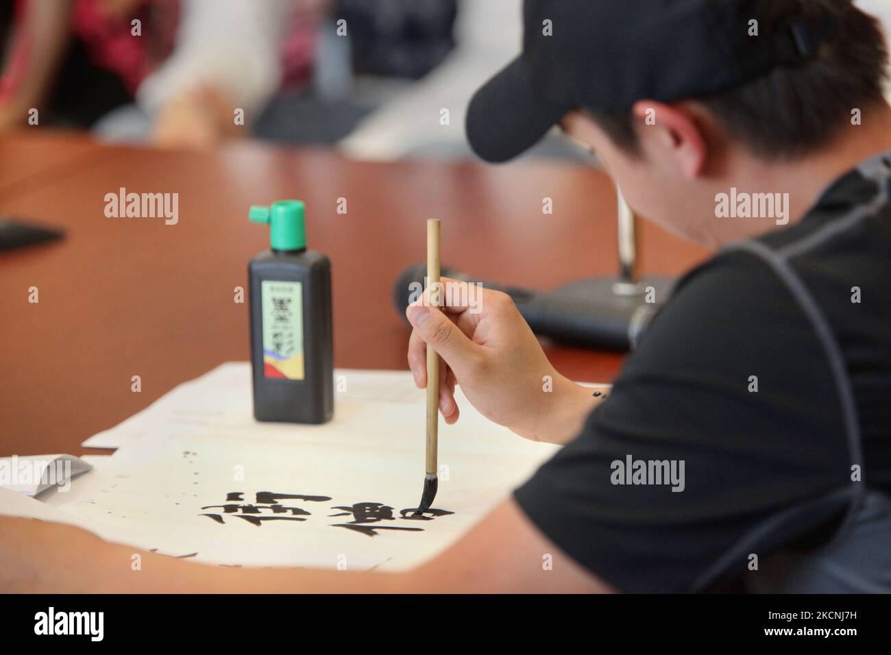 Chinese student demonstrates traditional Chinese calligraphy in Ontario ...