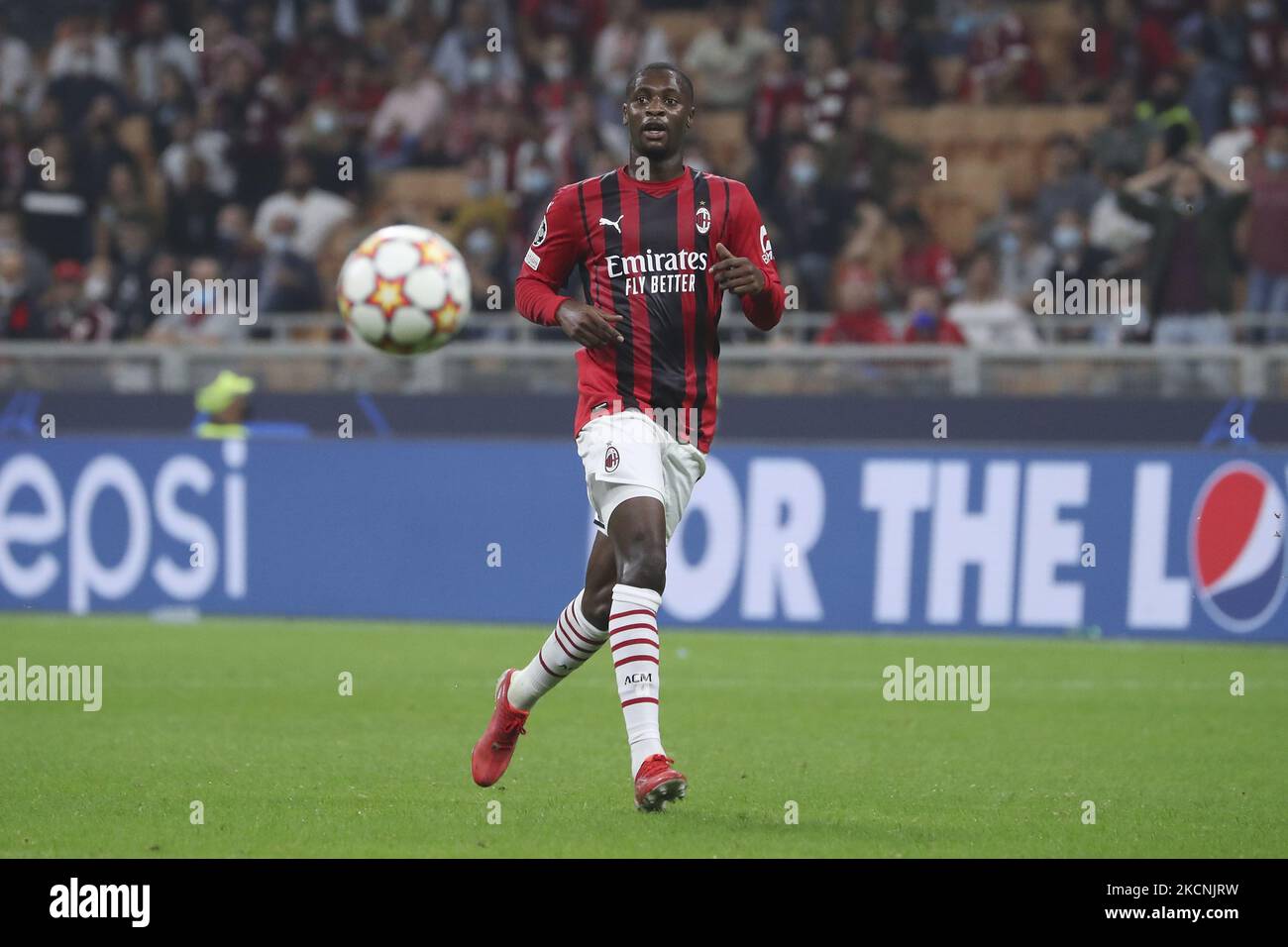 Fode' Ballo-Toure' of AC Milan in action during the UEFA Champions ...