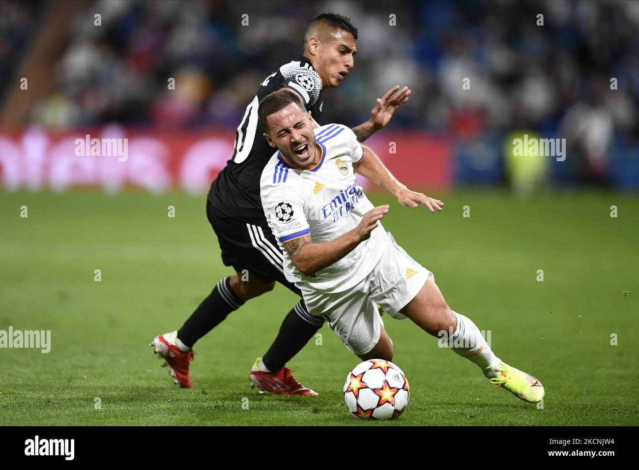 Eden Hazard of Real Madrid and Frank Castañeda of Sheriff compete for ...