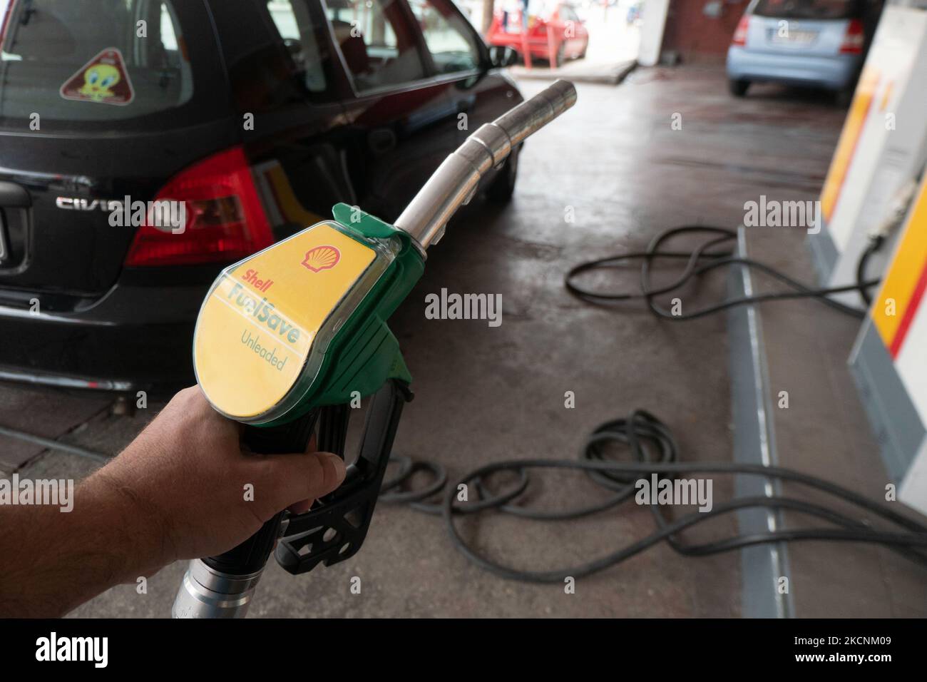 Filling nozzles and pumps at a Shell gas station in Evosmos ...