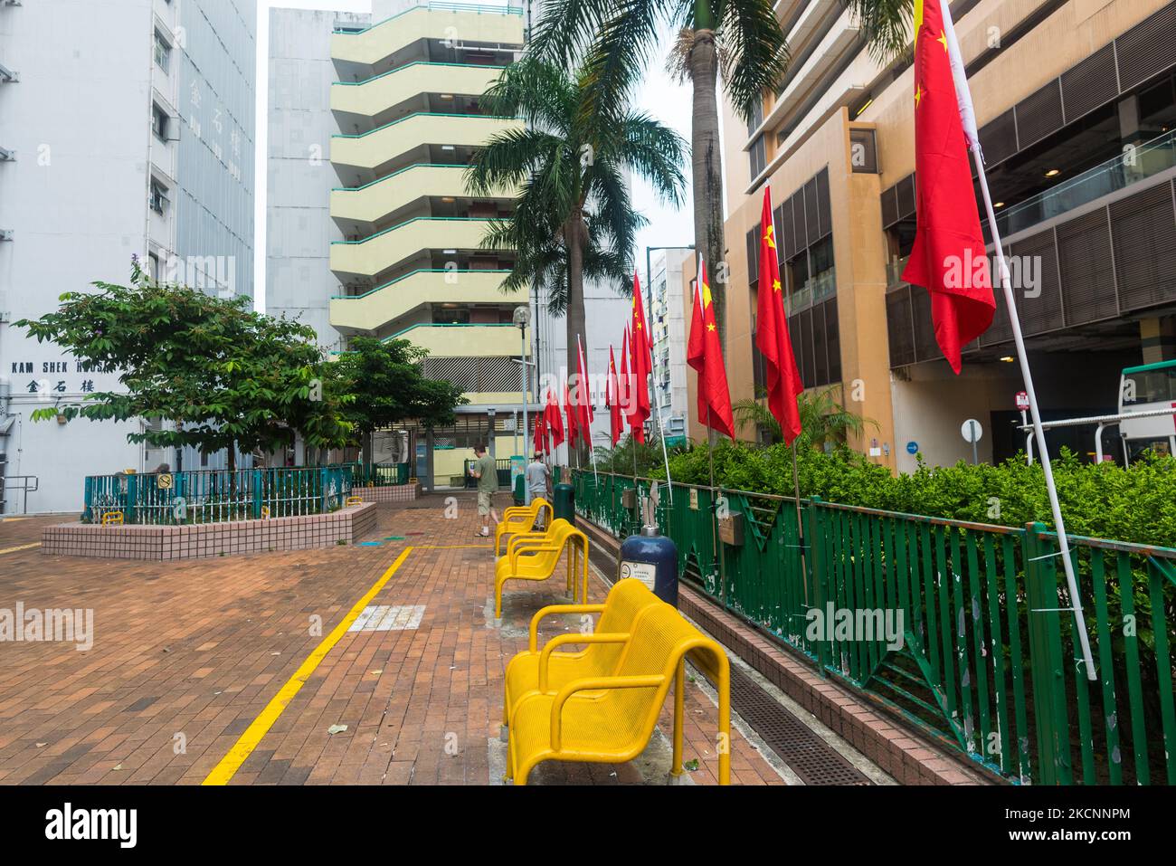 Chinese flags are hung in the Ping Shek estate. (Photo by Marc ...
