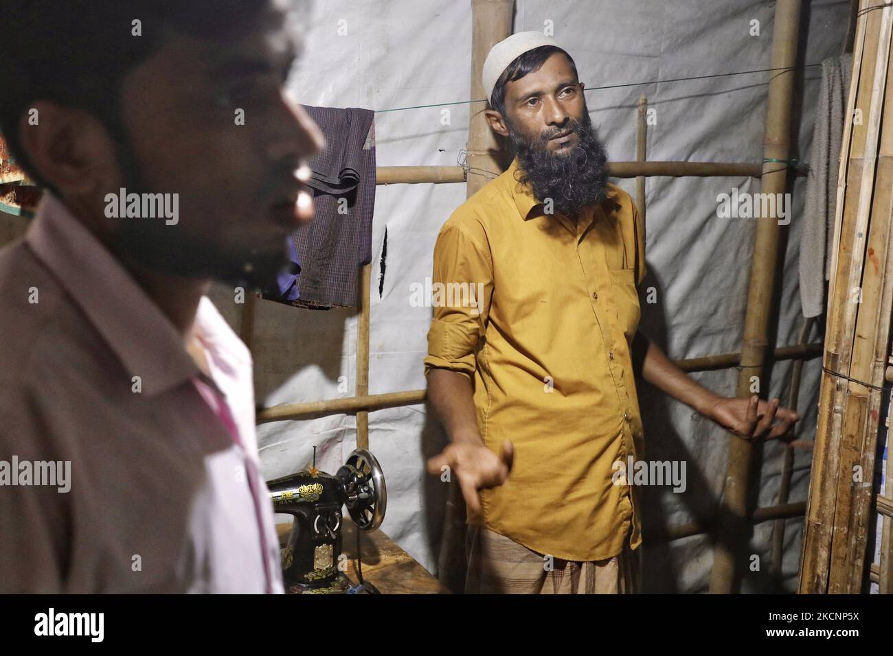 Rohingya people attend the funeral of Rohingya leader Mohibullah in kutupalang refugee camp in ...