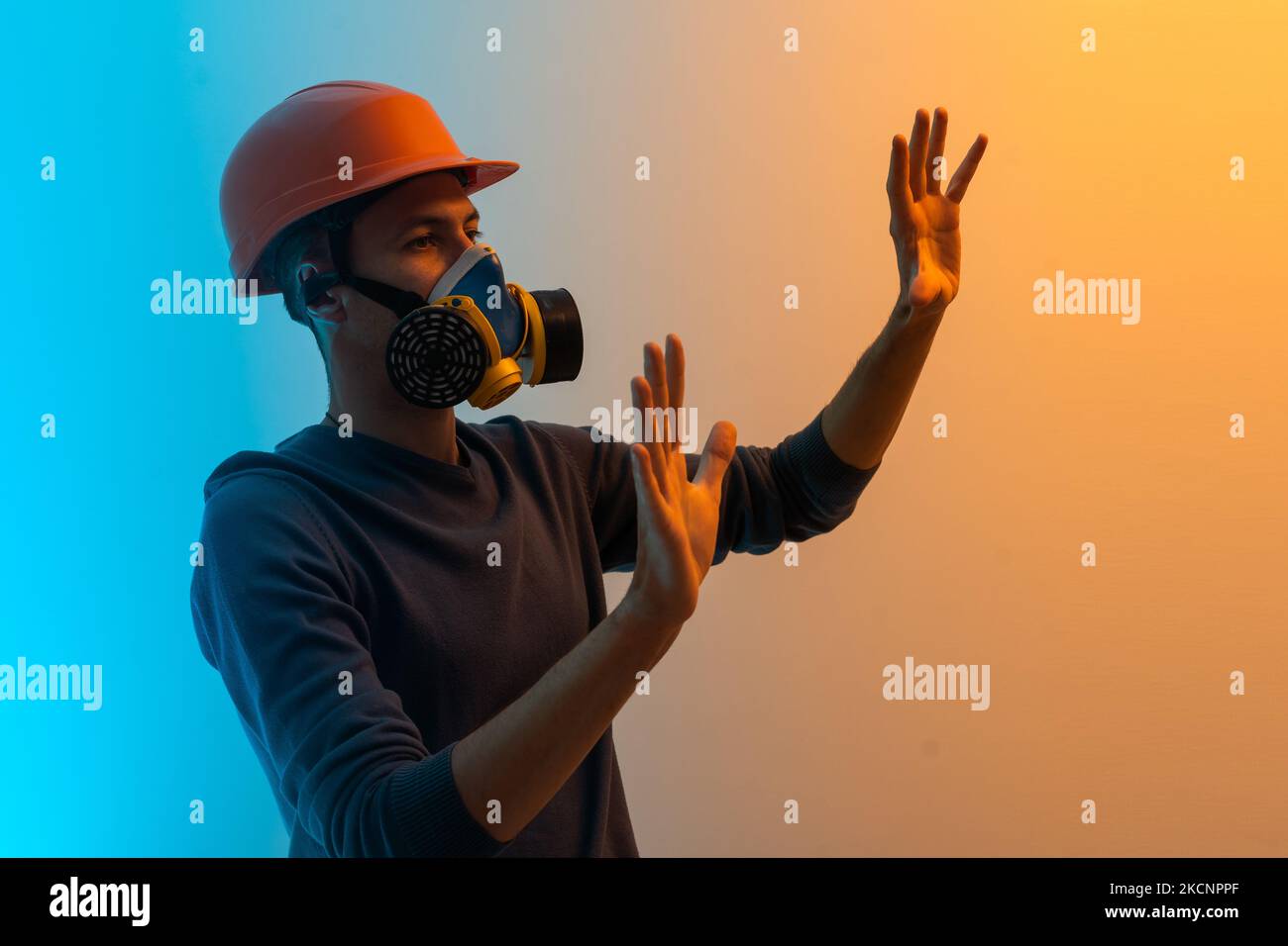 man in a mask with a filter and a helmet Stock Photo - Alamy